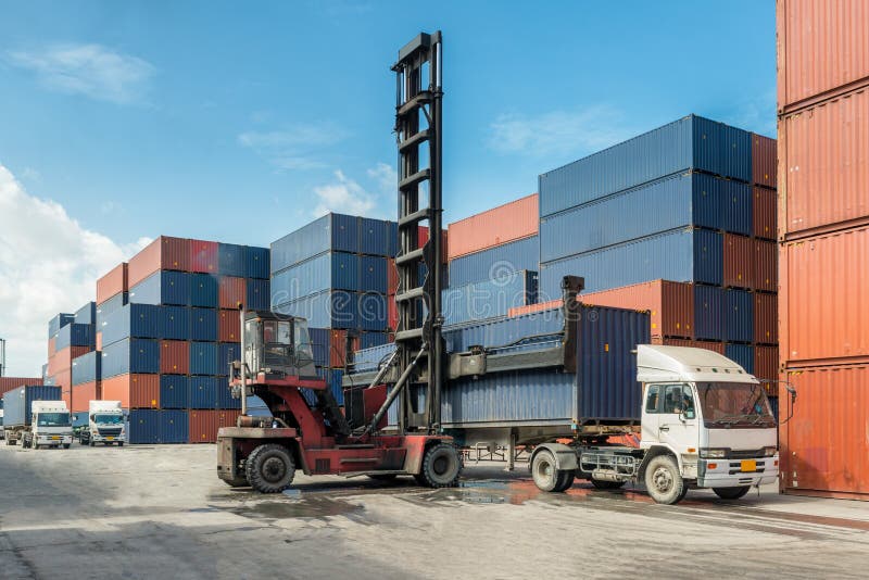 Forklift Handling Container Box Loading at Docks with Truck for Stock ...