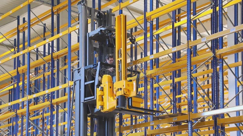 Forklift High Rack Stacker stock video. Video of warehouse - 192566017