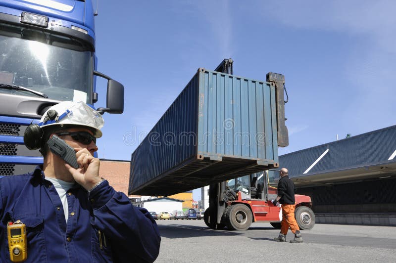 Forklift Hoisting Cargo and Shipping Containers Stock Photo - Image of ...