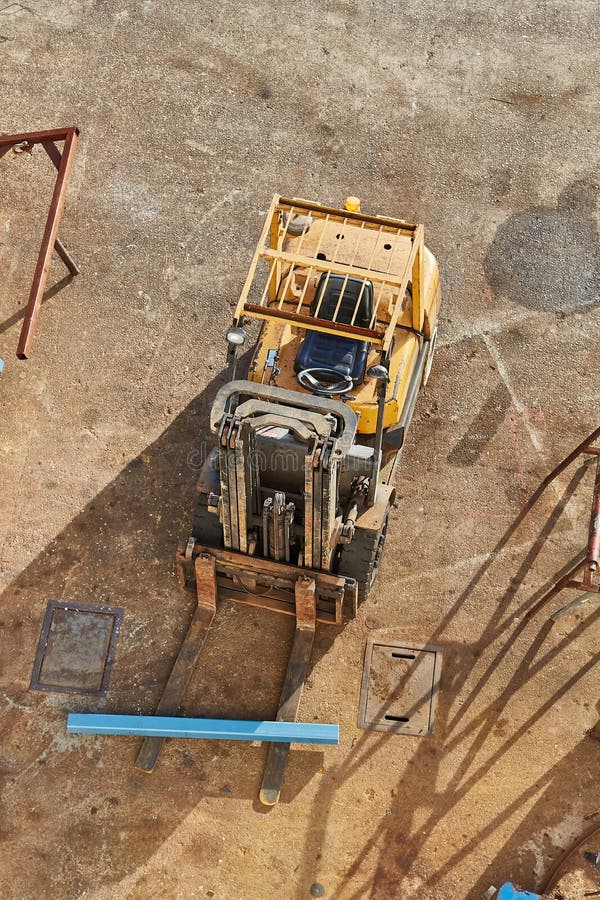 Forklift in an Industrial Yard Stock Photo - Image of concrete ...