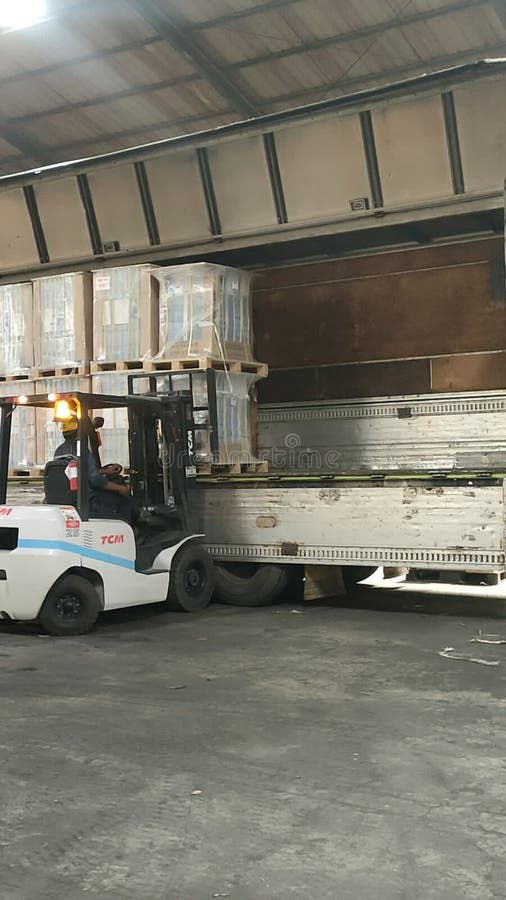 Forklift Loading Cargo Onto Truck Stock Footage - Video of shipping ...
