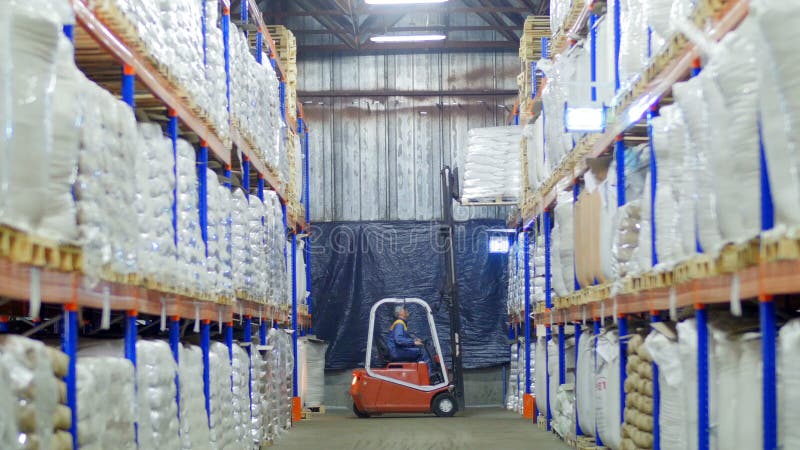 Forklift Loading Boxes on Shelf in Warehouse Stock Video - Video of ...