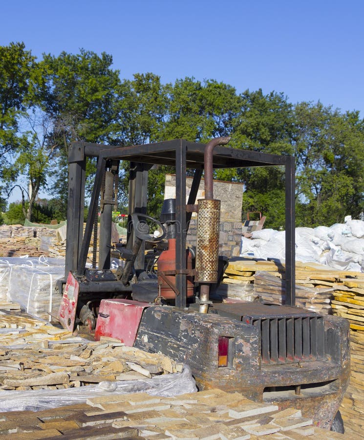 Forklift Loading and Moving Material Down from a Truck Stock Image ...