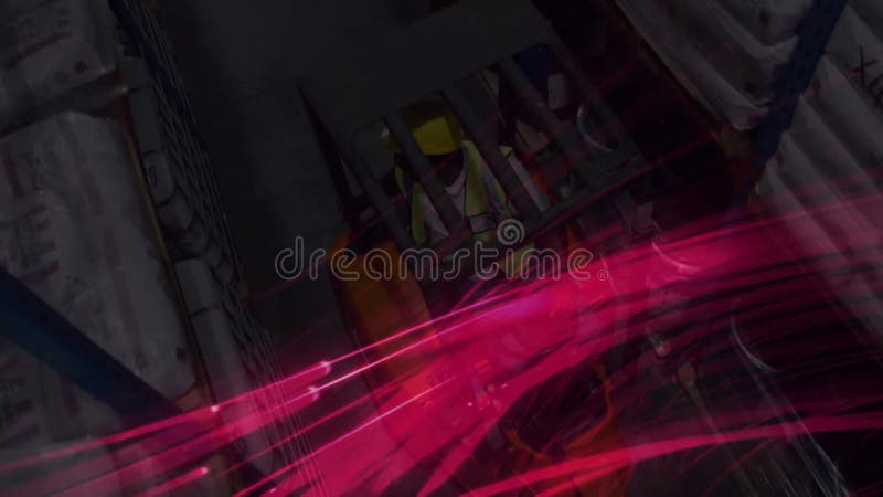 Forklift Operator Loading Pallets in Warehouse, with Red Light Streaks ...