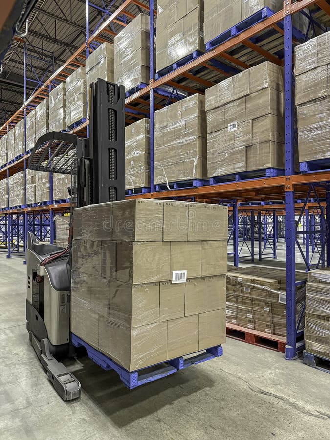 Forklift with Pallet of Boxes of Wine in Distribution Centre. Stock ...