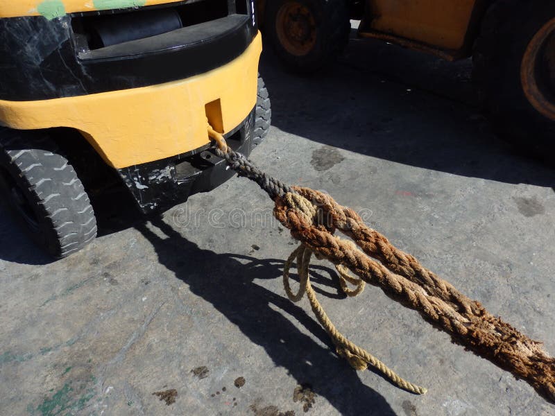 A Forklift Pulling a Heavy Load Stock Photo - Image of shipyard, yellow ...