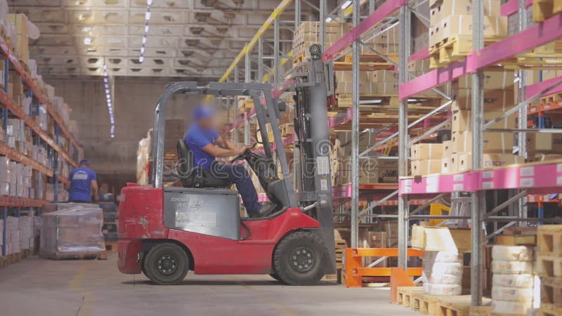 Forklift in the Warehouse Concept. Work in a Modern Warehouse Concept ...