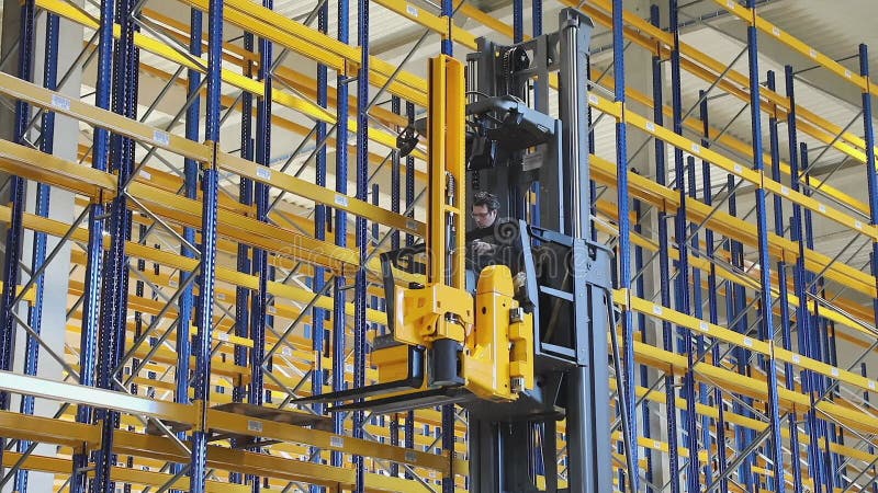 Forklift High Rack Stacker stock video. Video of warehouse - 192566017