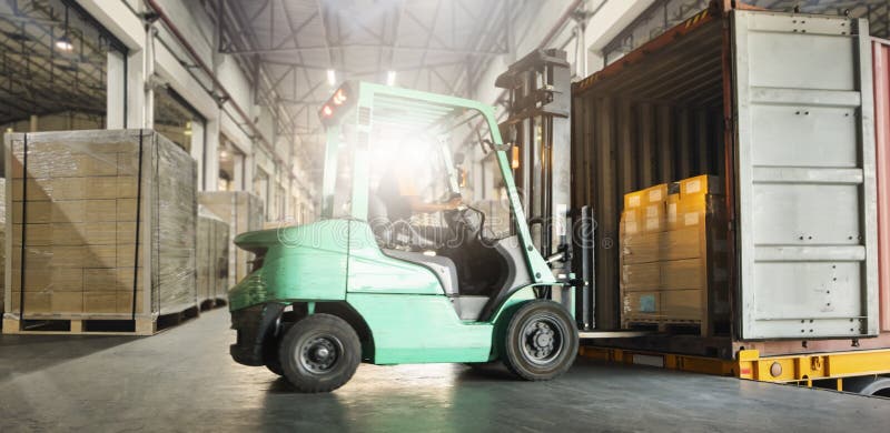 Forklift Tractor Loading Cargo Boxes Pallets into Container Trucks ...
