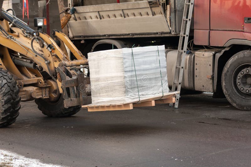 Forklift Transports the Pallet with the Load Stock Image - Image of ...