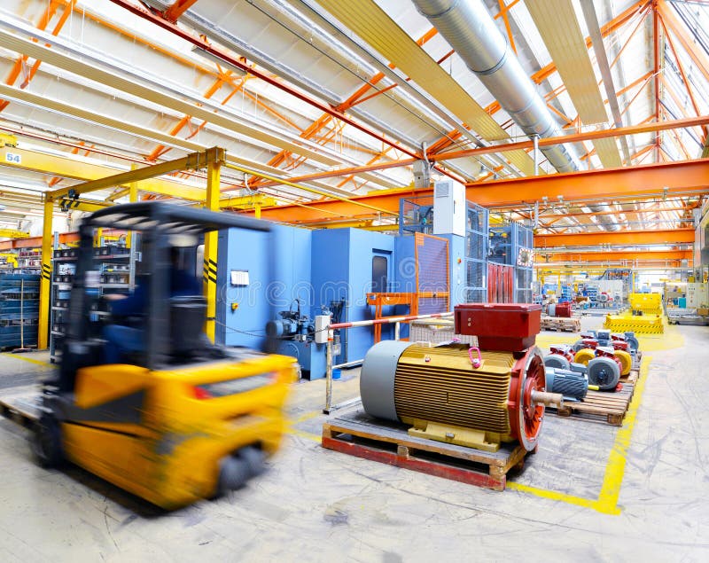 Forklift Truck Drives in an Industrial Hall - Interior in Mechanical ...