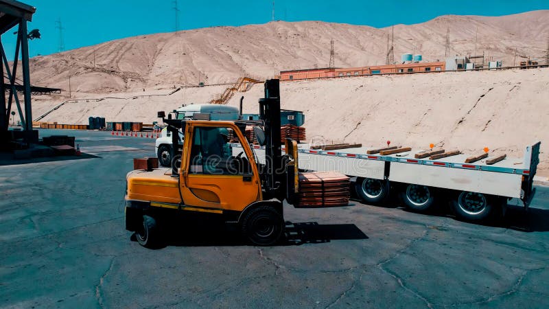 Forklift-type Machinery in the Process of Loading Copper Mining Plates ...