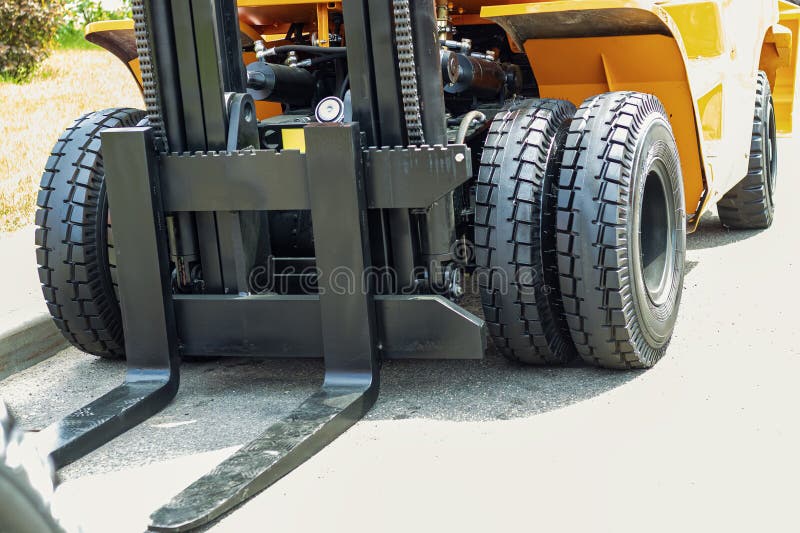 Forklift Unloading Cargo on a Sunny Day at a Warehouse Facility Near ...