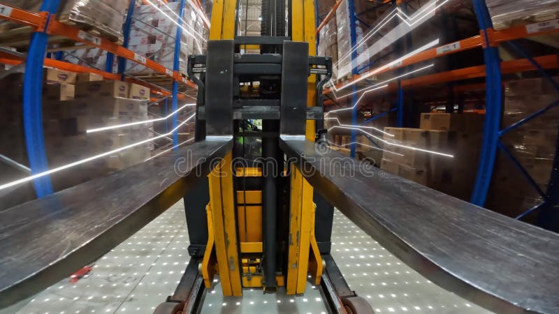 Forklift in the Warehouse Concept. Work in a Modern Warehouse Concept ...