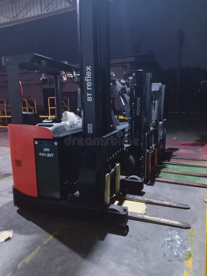 3 Forklifts Parked in the Factory Field Editorial Photography - Image ...