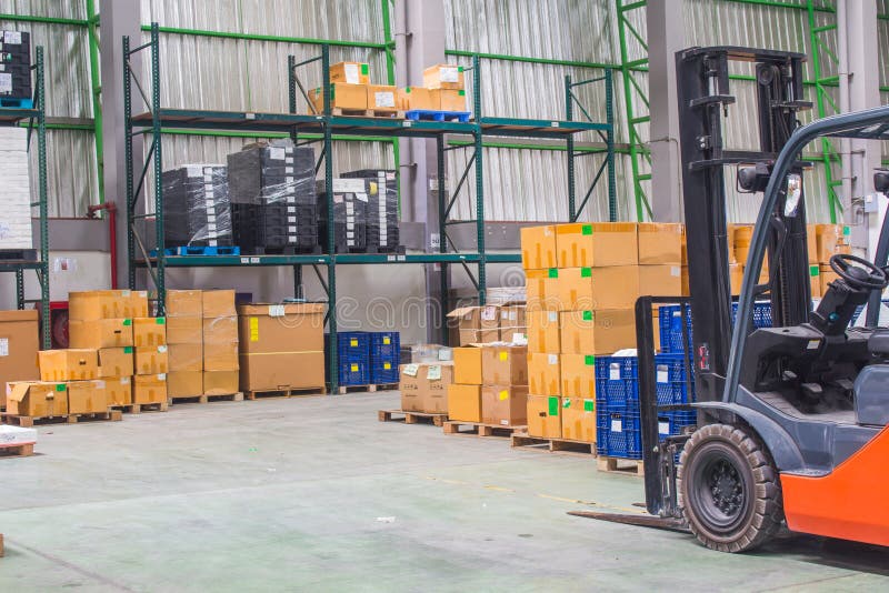 Forklifts are Storing Products. within the Warehouse Stock Image ...