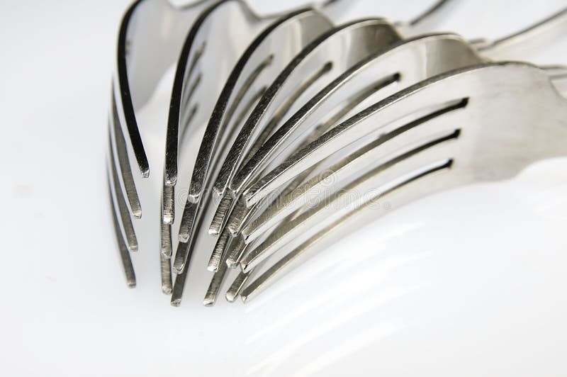Forks Arranged in Series on the Kitchen Table. Stock Photo - Image of ...