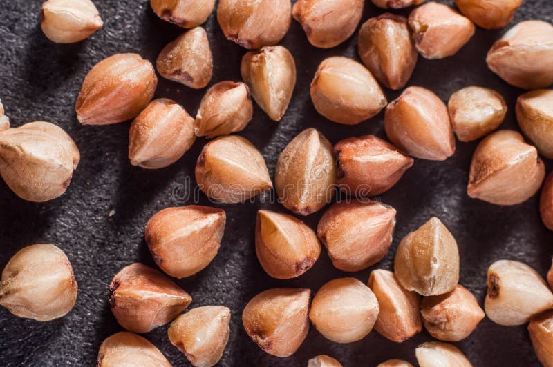 Form and Structure of Buckwheat Cereal Closeup on a Dark Background ...