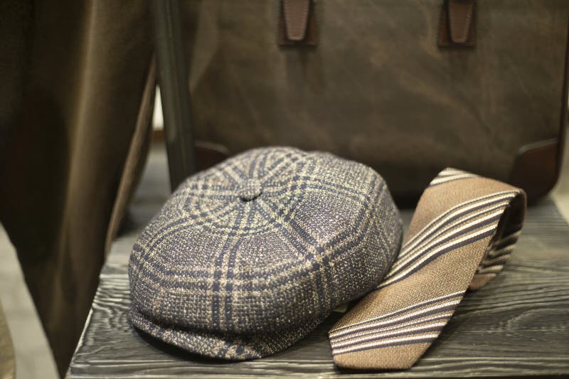Formal Clothes. Cap and Tie on Display Stock Photo - Image of menswear ...