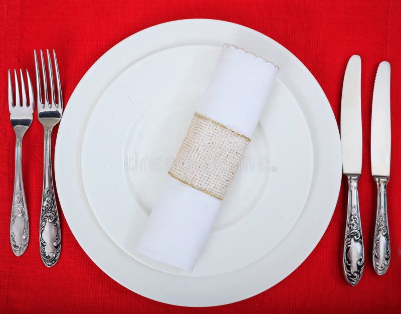 Formal Table Setting on Red Tablecloth Stock Photo - Image of ...