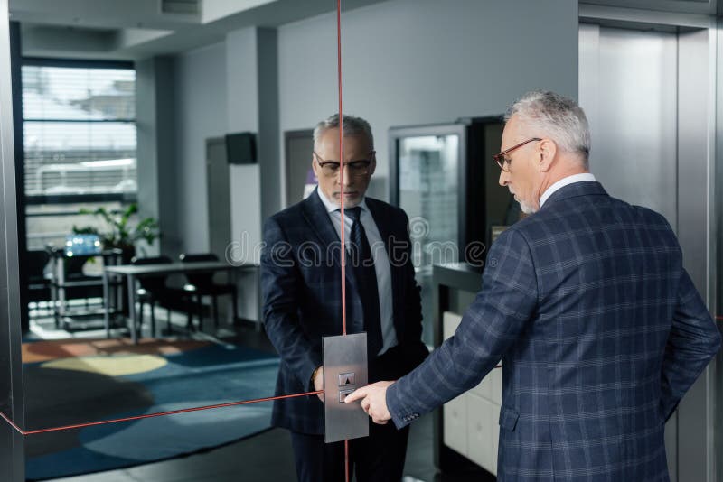 In Formal Wear Pushing Button of Stock Image - Image of buttons ...