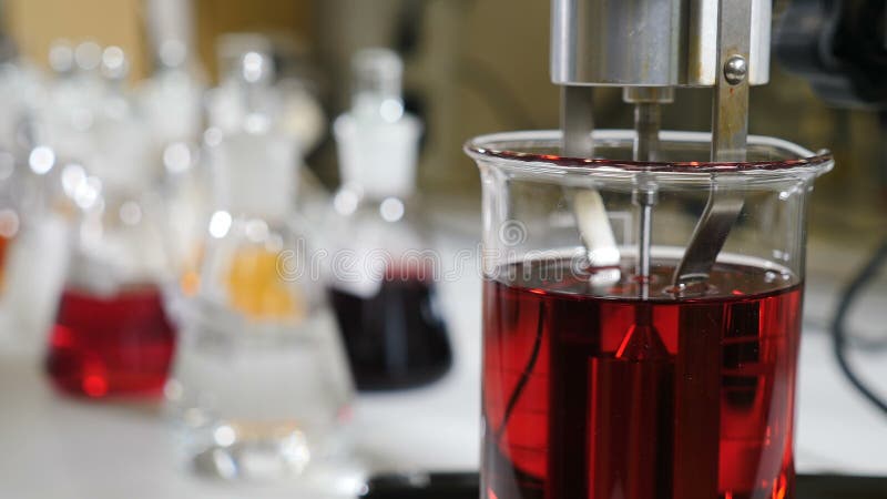 Formalin Production Testing. Liquids Being Mixed in Transparent Bowl ...
