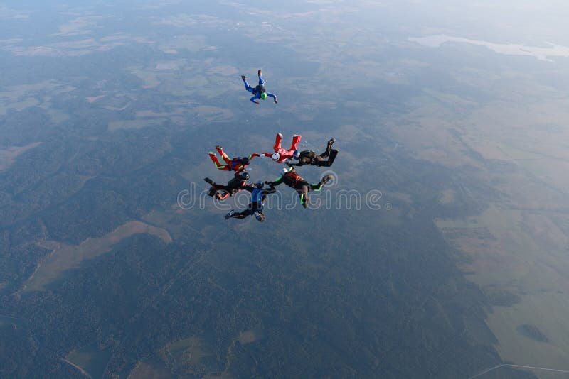 Formation Skydiving. Skydivers are Falling in the Sky. Stock Photo ...