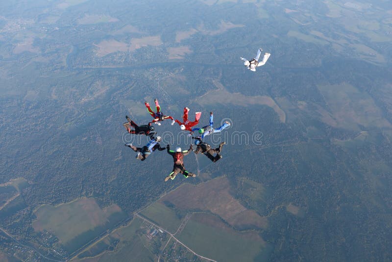 Formation Skydiving. Skydivers are Falling in the Sky. Stock Image ...