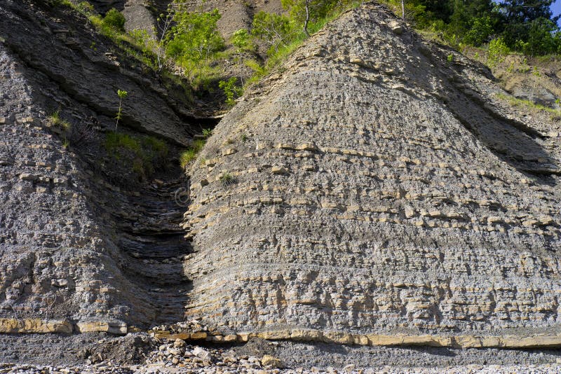 Formation of a Stacked Layers of Rock Stock Photo - Image of process ...