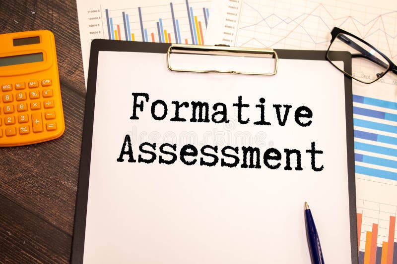 Formative Assessment Top View of Text Near White Keyboard. Stock Image ...