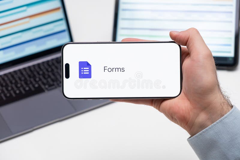 Forms Application Logo on the Screen of Smart Phone in Mans Hand ...