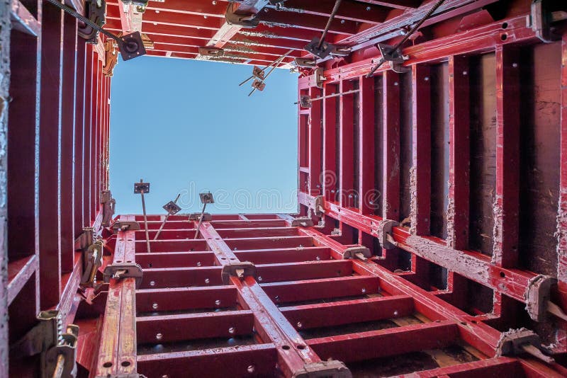 Formwork panels and clamps stock photo. Image of building - 256953526