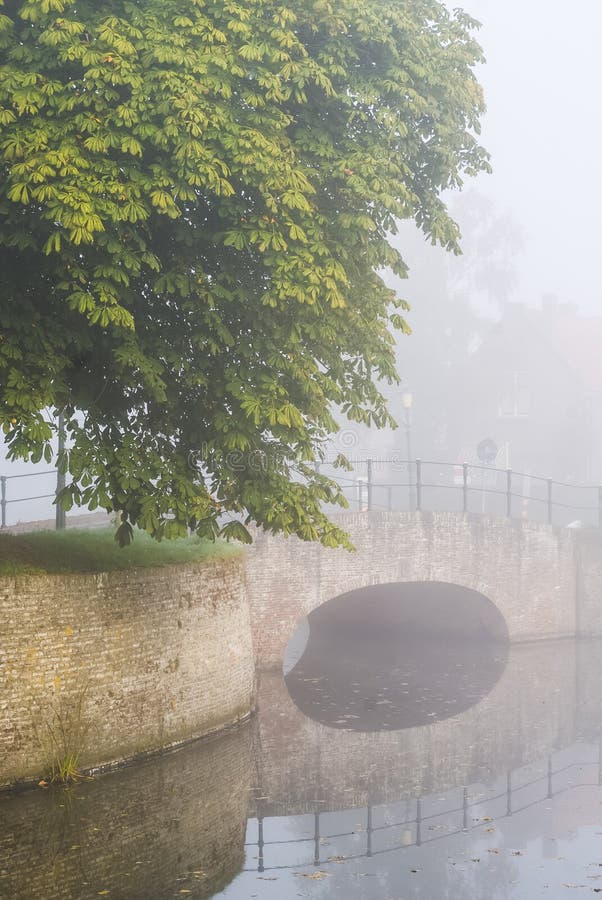 Fortified Bridge Reflection in Water Stock Image - Image of building ...