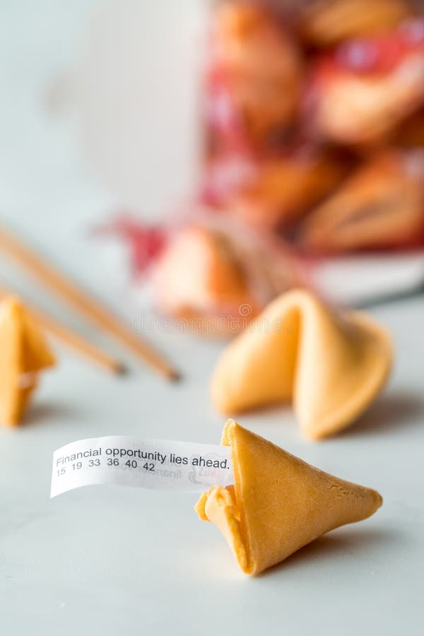 Fortune Cookies with a Fortune Note Sticking Out of the One in Front ...
