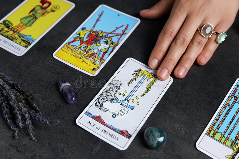 Fortune Teller Predicting Future on Spread of Tarot Cards at Grey Table ...