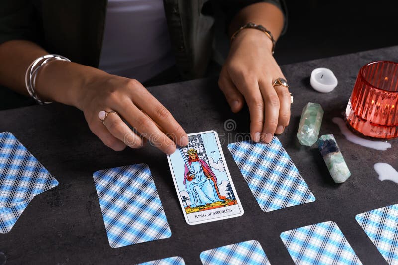 Fortune Teller Predicting Future on Spread of Tarot Cards at Grey Table ... Fortune Teller Predicting Future on Spread of Tarot Cards at Grey Table ...