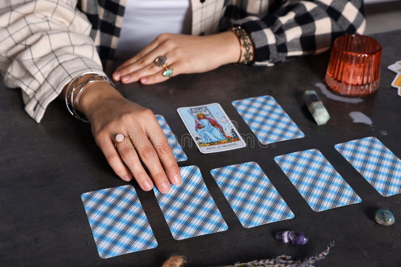 Fortune Teller Predicting Future on Spread of Tarot Cards at Grey Table ...