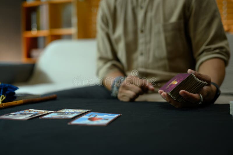 Fortune Teller Reading Tarot Cards on Table with a Mystical Cloth ...