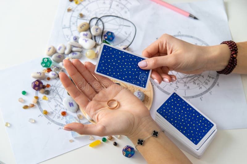 A Fortune Teller Reads with Tarot Cards. Selective Focus Stock Image ...