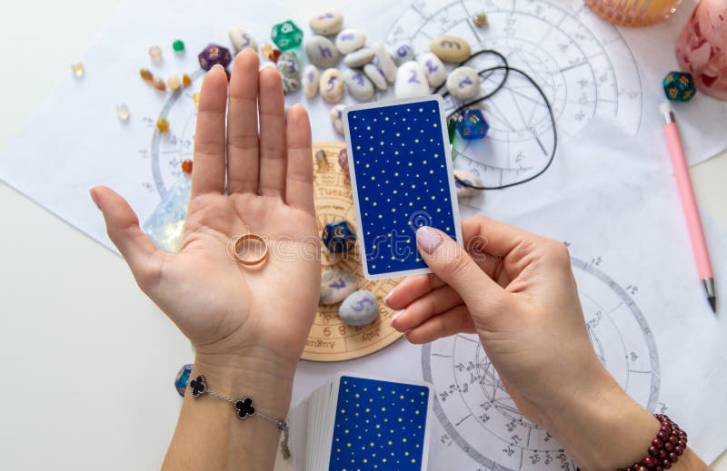 A Fortune Teller Reads with Tarot Cards. Selective Focus Stock Image ...