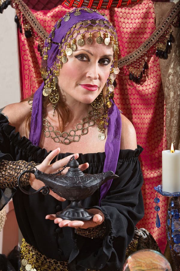 Fortune Teller Rubs the Lamp Stock Image - Image of beautiful, grinning ...