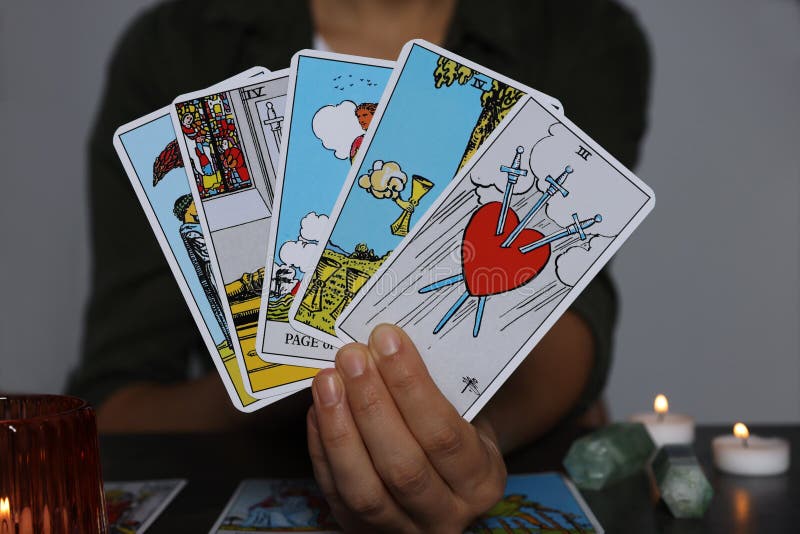 Fortune Teller with Tarot Cards at Grey Table Indoors, Closeup Stock ...