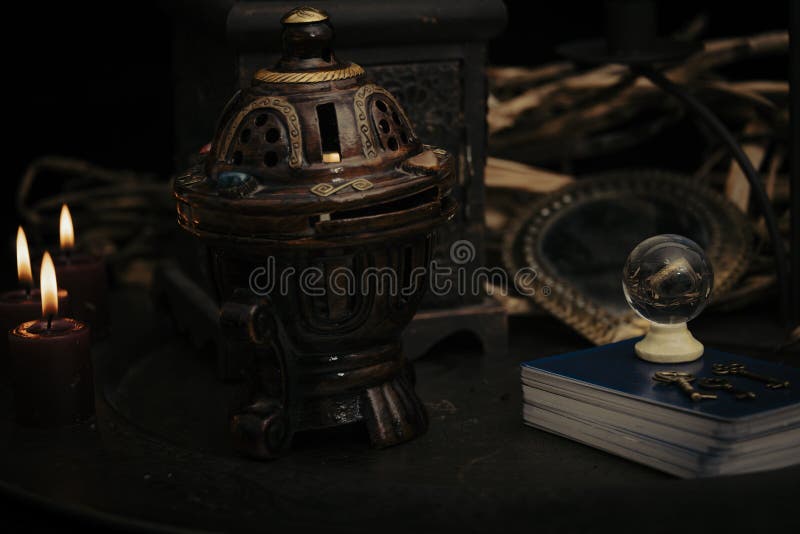 A Fortune Teller, Witch Stuff on a Table, Candles and Fortune-telling ...
