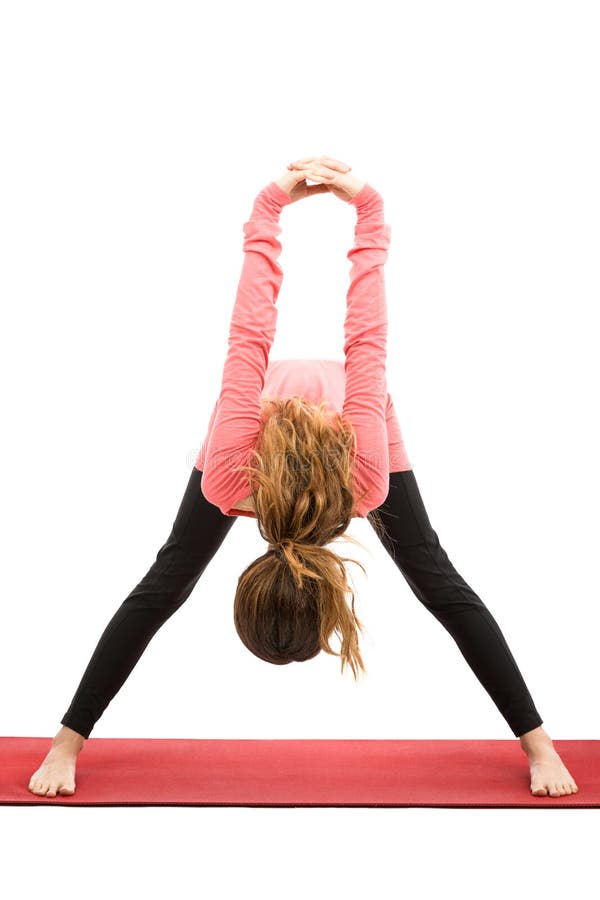 Forward Bend with Shoulder Stretching in Yoga Stock Photo - Image of ...