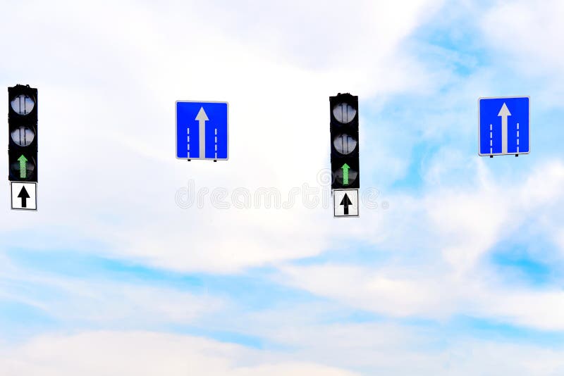 Forward. Green Traffic Light and a Pointer Directly Against the Blue ...