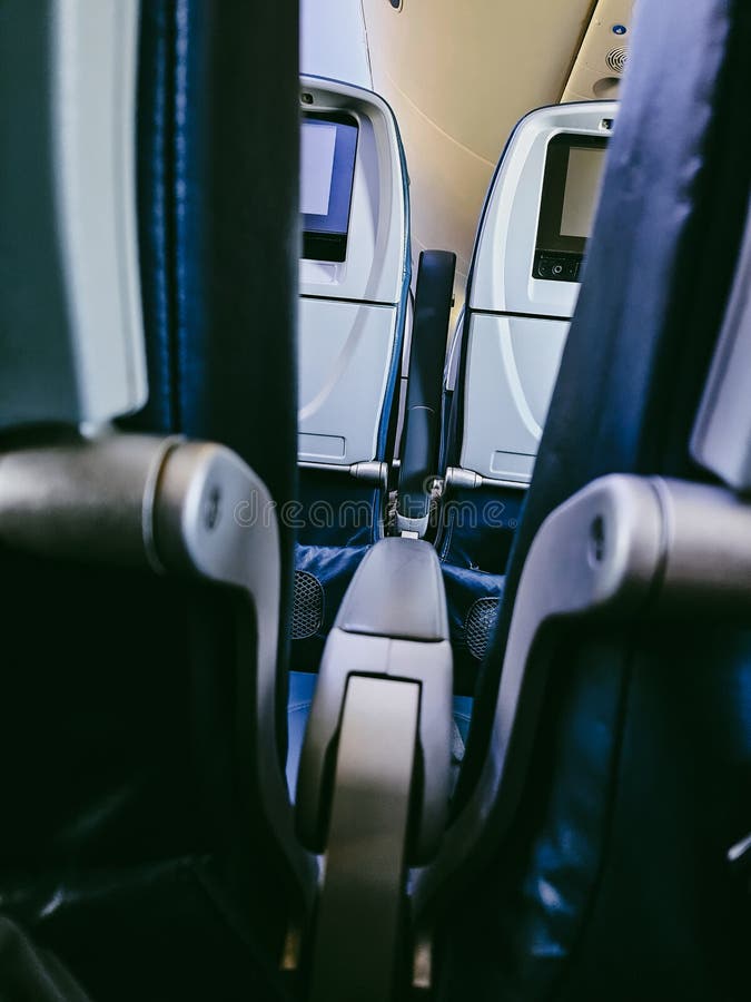 Close Up of Armrest Inside an Airplane during Flight Stock Photo ...