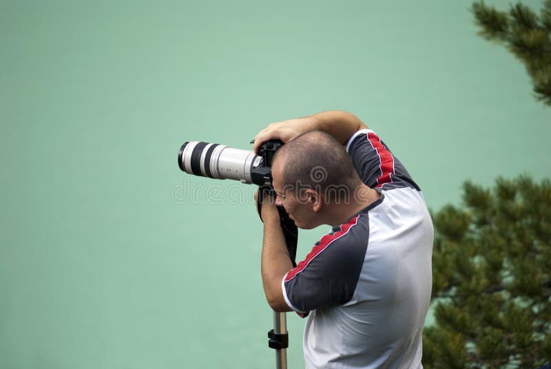 Fotografo professionista immagine stock. Immagine di interesse - 10555609