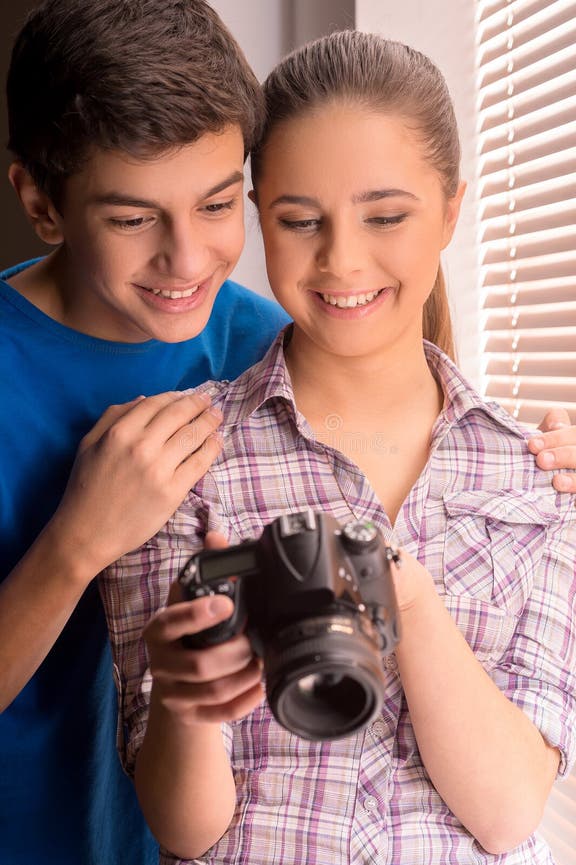 Fotógrafos Del Adolescente. Imagen de archivo - Imagen de concentrado, doméstico: 33969847
