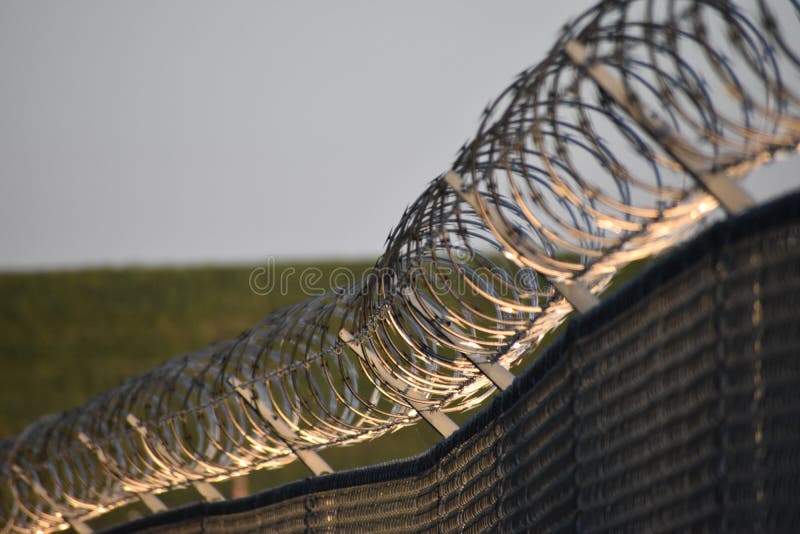 Razor Wire Fence in Fort Worth Texas Stock Image - Image of hill ...