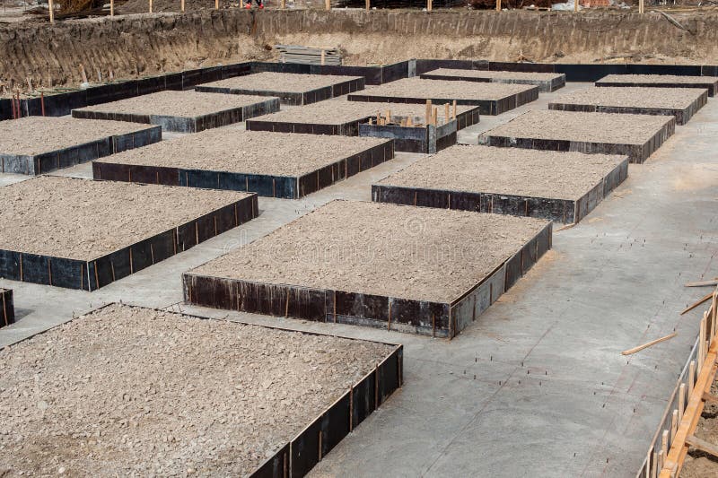 Foundation Blocks on a Construction Site Stock Photo - Image of crane ...